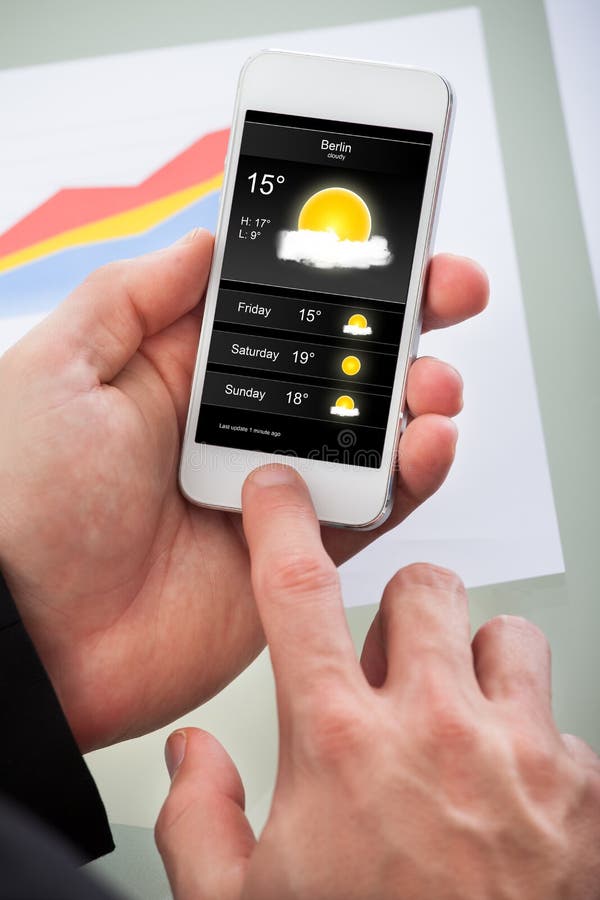 Man Checking the Weather Forecast for the Day Stock Photo - Image of ...