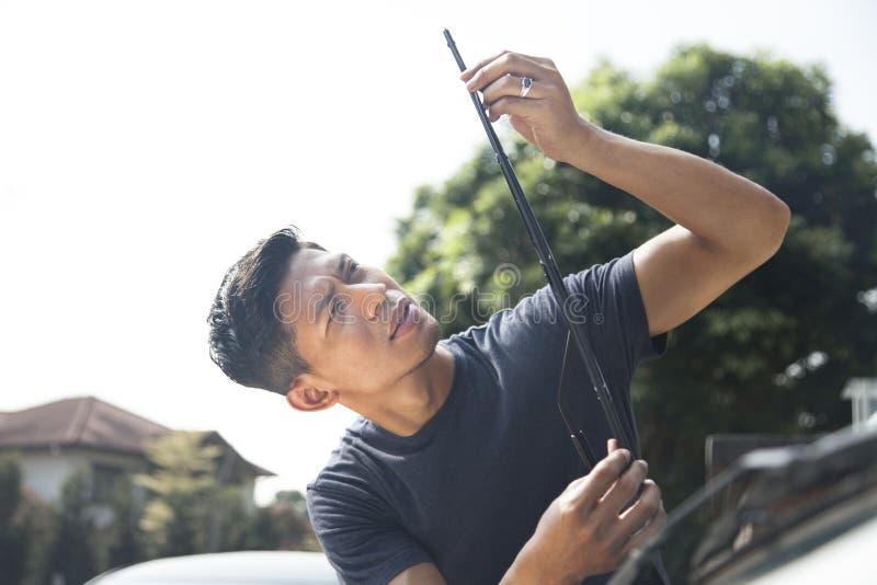 Man Checking Windshield Wiper Stock Photo - Image of ethnicity, vehicle ...