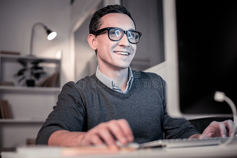 Cheerful Positive Man Looking at the Computer Screen Stock Photo ...