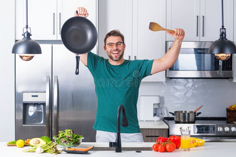 Man Chef Cooking Food in Pan Pot in Kitchen. Process of Preparing ...