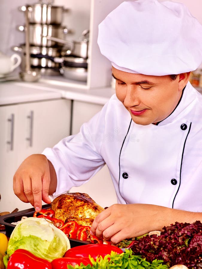 Man in Chef Hat Cooking Chicken Stock Image - Image of dinner, kitchen ...