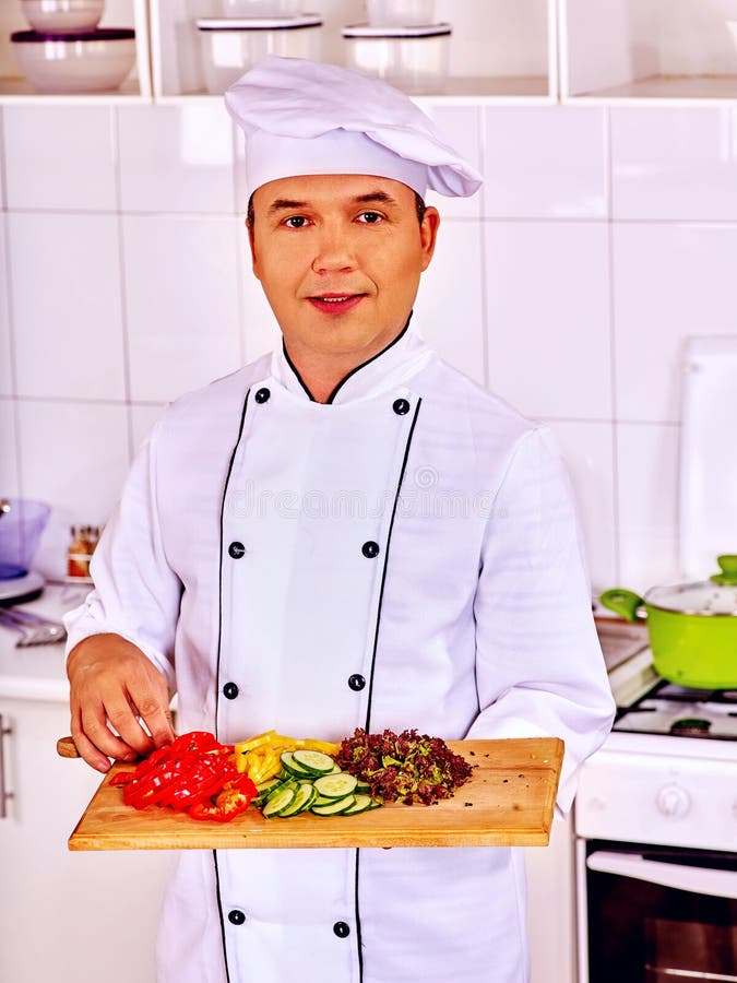 Man in chef hat cooking stock image. Image of business - 55460183