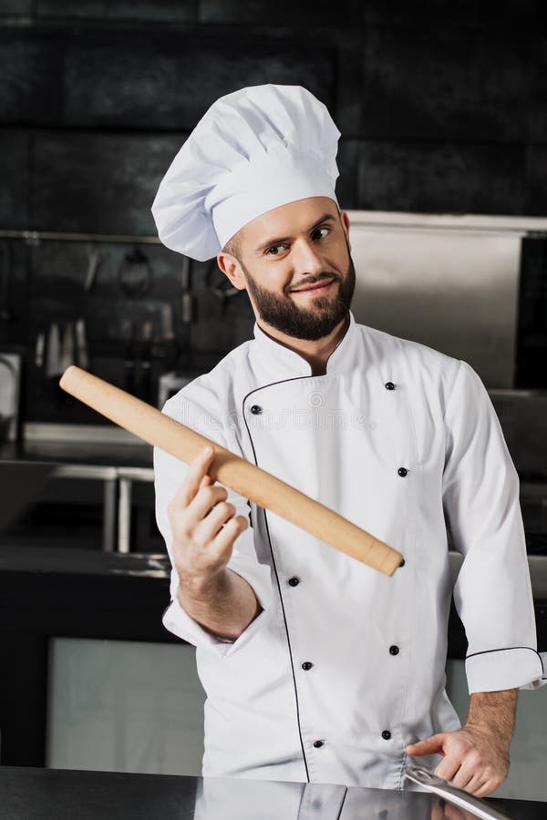 Man Chef With Roller At Restaurant. Professional Man Play With Rolling ...