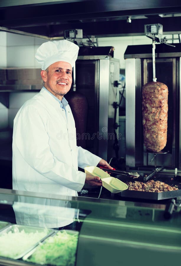 Man Chef Serving Fresh Kebab Stock Photo - Image of male, mature: 82506018