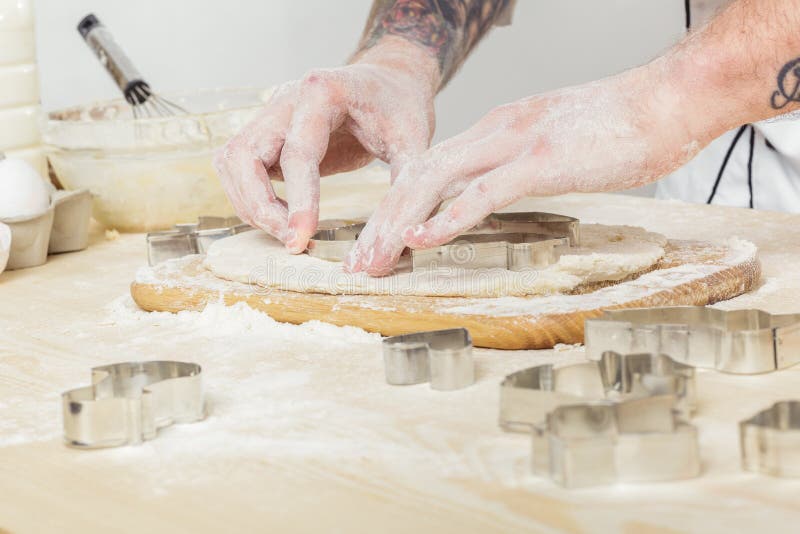 Man Chef in Uniform Makes Cookies with Baking Forms Stock Image - Image ...