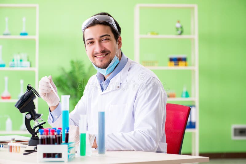 The Man Chemist Working in the Lab Stock Image - Image of microscope ...
