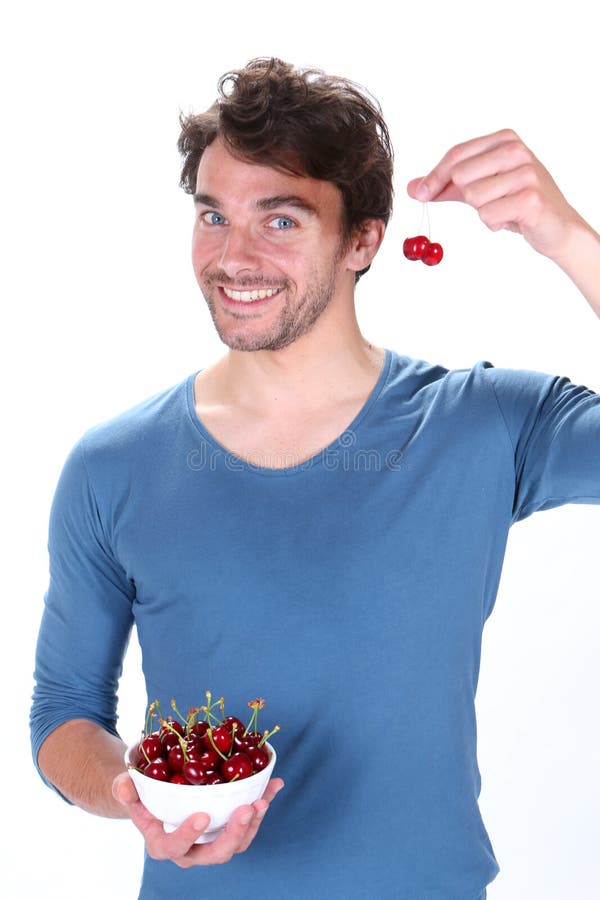 Man with cherry stock image. Image of juice, lovely, give - 34039359