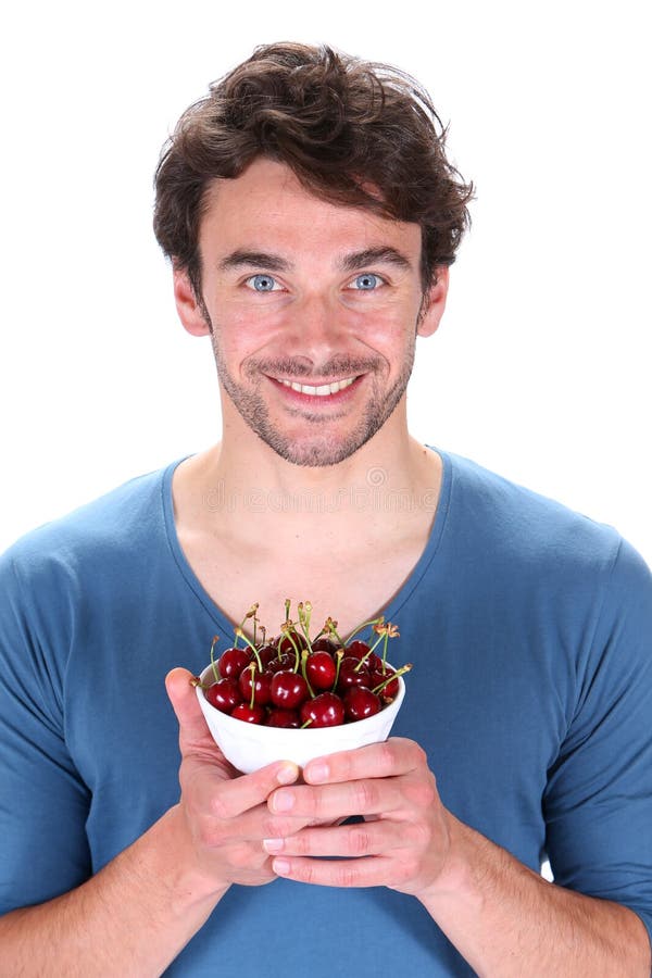 Man with cherry stock image. Image of juice, lovely, give - 34039359