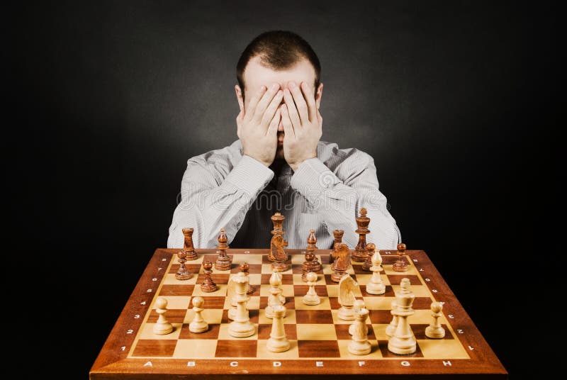 Man at chess board stock image. Image of chessboard, opponent - 23587301