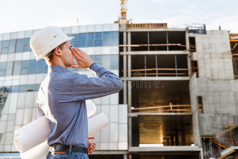Man the Chief Engineer at Construction Site Screams of Danger. Stock ...