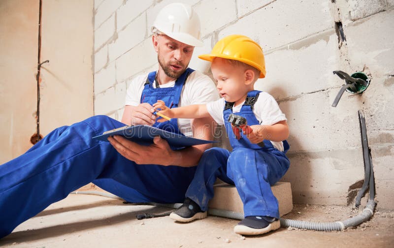 Man and Child Construction Workers Using Electric Angle Grinder. Stock ...
