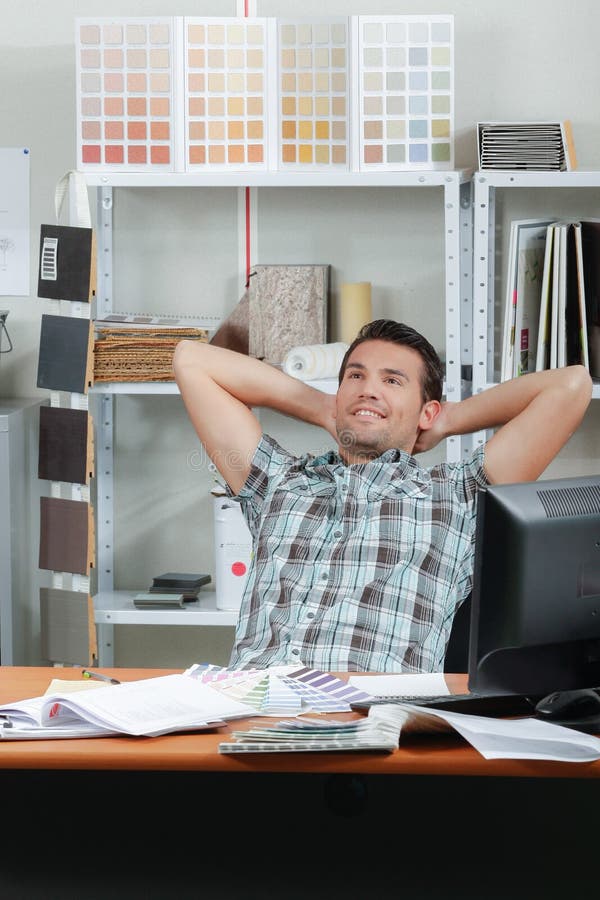 Man chilling out in office stock photo. Image of successful - 74871332