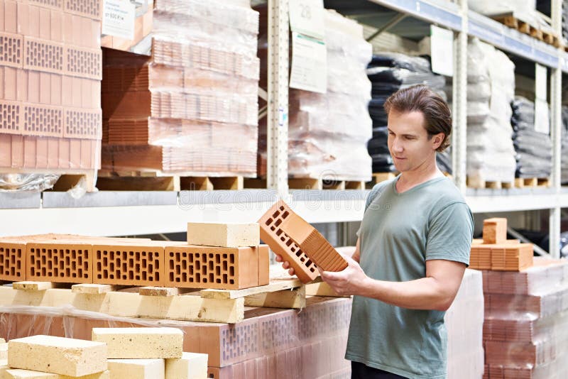 Man Chooses and Buys Bricks in Store Stock Image - Image of shop ...