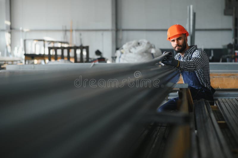 Man Chooses Metal Profile for Construction in Factory Stock Photo ...