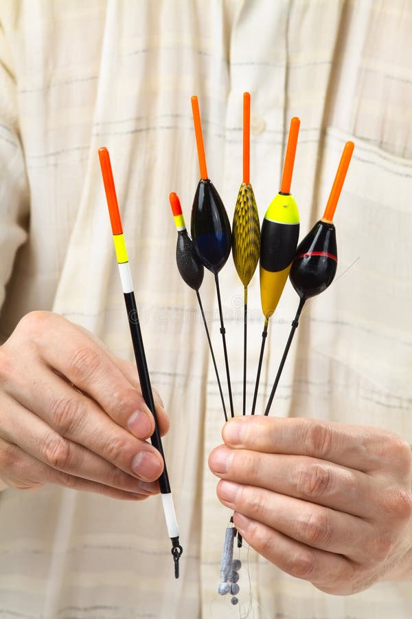 Man Chooses the Preferable Float from Several Floats Stock Image ...