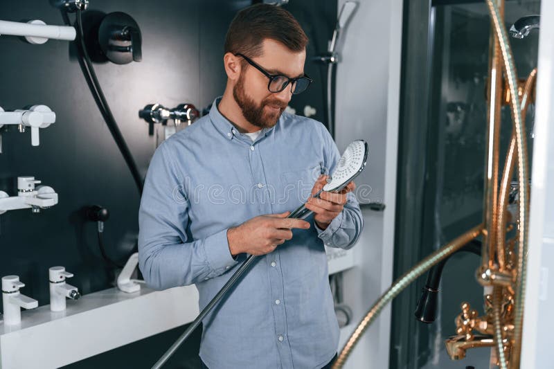 Man Chooses a Products in a Sanitary Ware Store Stock Image - Image of ...