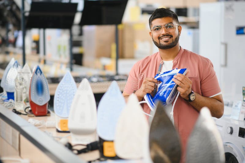 Indian Man Choosing Electric Iron at Store Stock Photo - Image of hindu ...