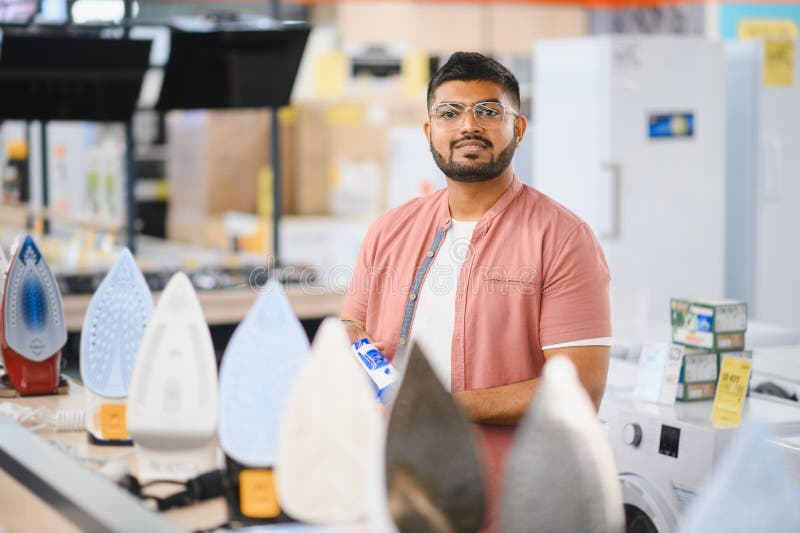 Indian Man Choosing Electric Iron at Store Stock Image - Image of ...