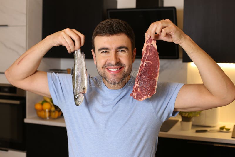 Man Choosing between Fish or Meat Stock Photo - Image of chef, balanced ...