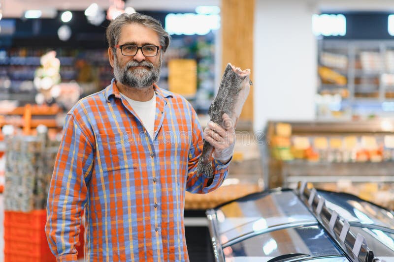 Man Choosing Fresh Chilled Fish in Grocery Store Stock Photo - Image of ...
