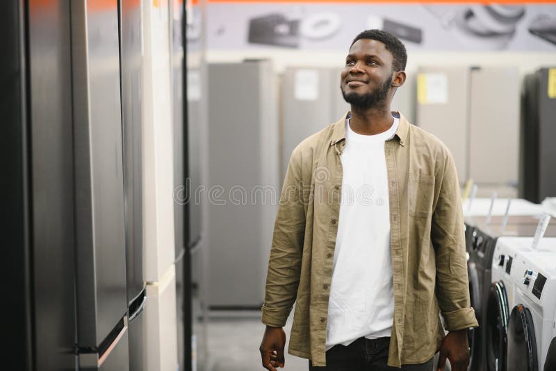 Man Choosing Fridge in the Shop Stock Photo - Image of household ...