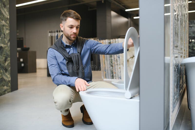 Man Choosing Home Toilet in Store Stock Photo - Image of market, flush ...