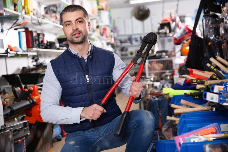 Man is Choosing New Construction Pliers in Tools Store Stock Photo ...