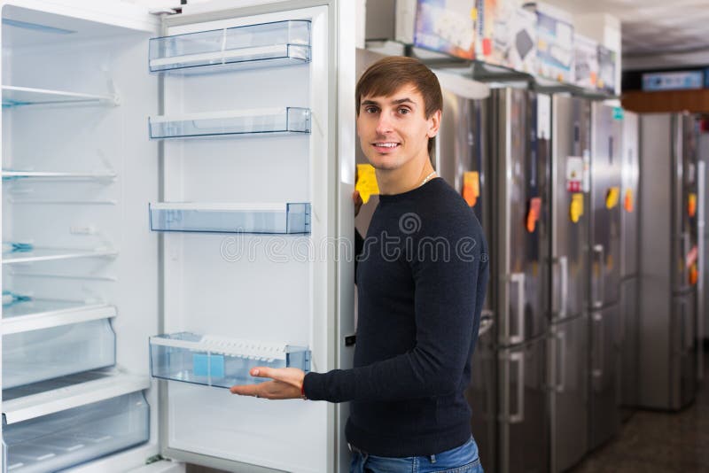 Man Choosing New Refrigerator Stock Photo - Image of casual, appliances ...