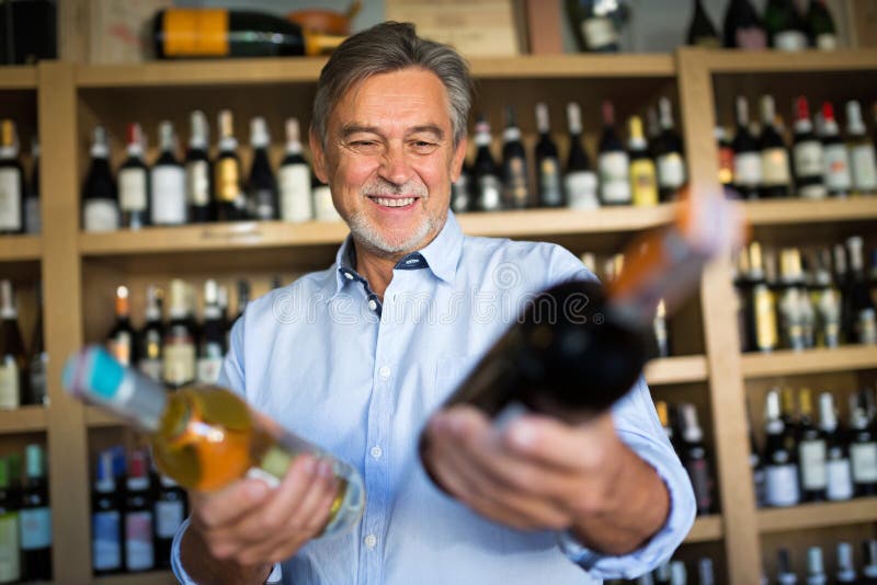 Man choosing wine stock image. Image of caucasian, alcohol - 79353263