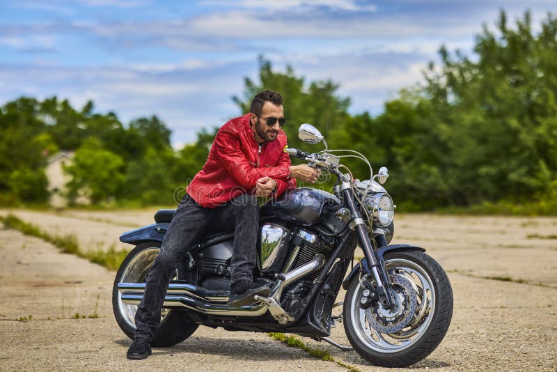 Man on a Chopper Motorcycle Stock Photo - Image of pose, freedom: 221371144