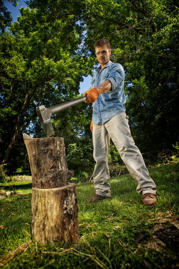 Man chopping wood stock photo. Image of nature, industry - 33530496