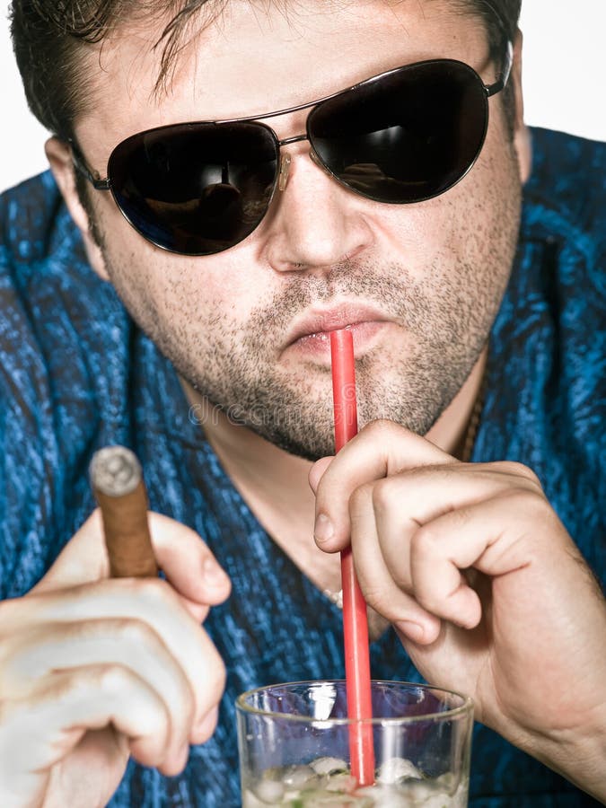 Man with cigar and coctail stock image. Image of face - 15217747