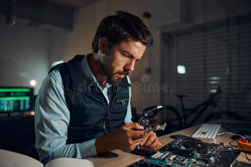 Man, Circuit and it Repair Workshop in Night for Maintenance, Computer ...