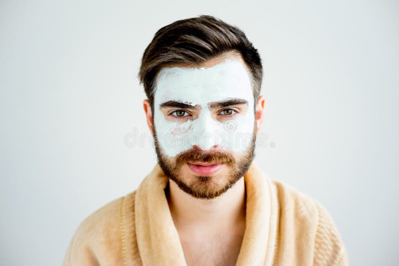 Man with a clay mask stock image. Image of pampering - 96381113
