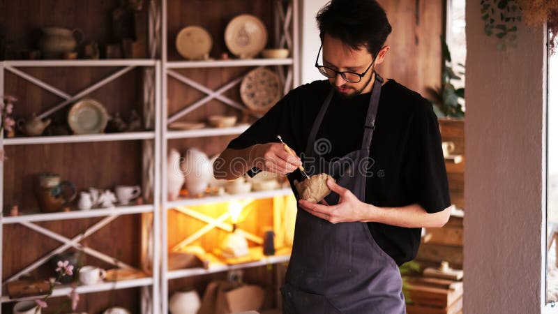 A Man at a Clay Modeling Master Class Learns How To Make Dishes Stock ...