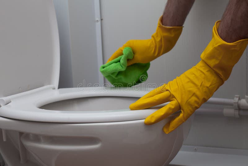 Man is Cleaning in the Bathroom. Wash the Toilet Stock Photo - Image of ...