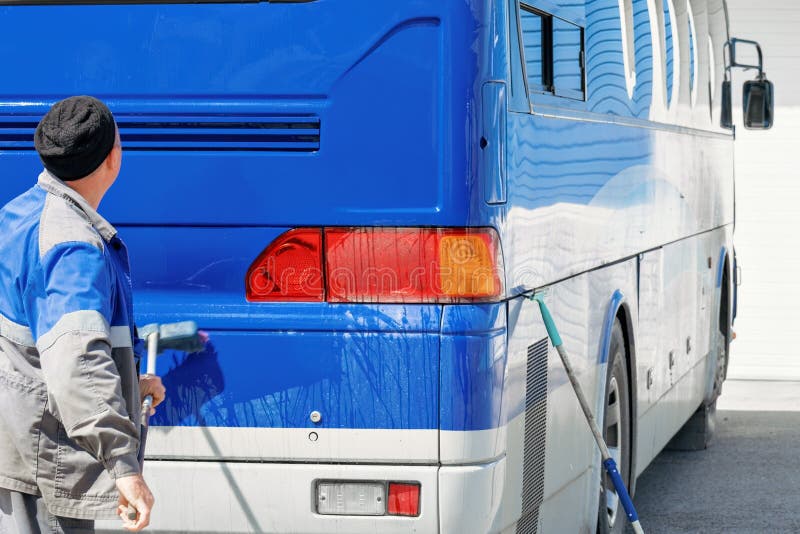 Man Cleaning a Blue Bus with a Brush Stock Photo - Image of worker ...