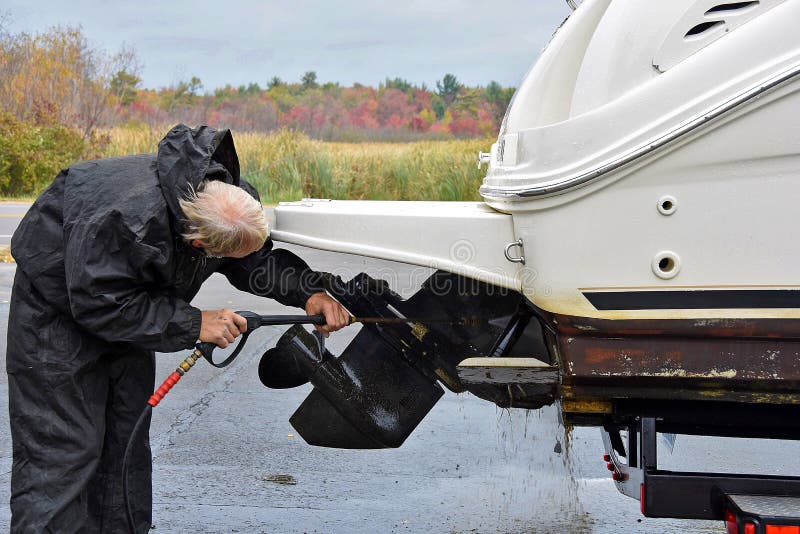 Caucasian Man Cleaning Boat Hull Stock Image - Image of suit, nautical ...
