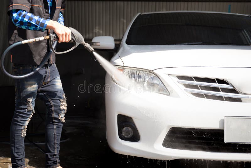 Man Cleaning a Car with High Pressure Jet Pump Stock Image - Image of ...