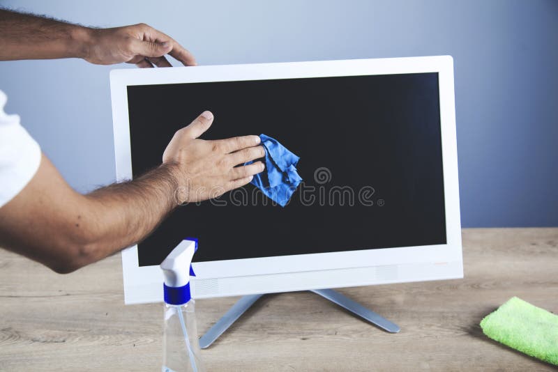 Man cleaning computer stock photo. Image of clean, monitor - 157767214