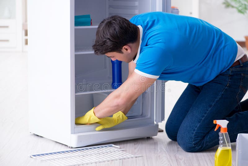 The Man Cleaning Fridge in Hygiene Concept Stock Photo - Image of ...