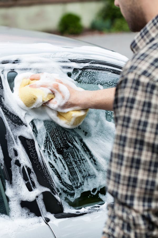 Man cleaning his car stock image. Image of preparation - 43876475
