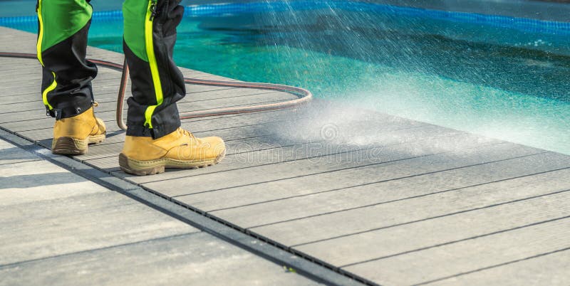 Man Cleaning His Poolside Deck with a Water Stock Photo - Image of ...