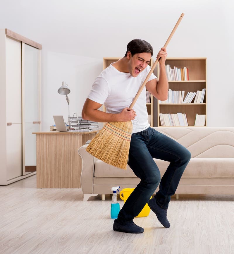 Man Cleaning Home with Broom Stock Image - Image of life, dust: 331308241