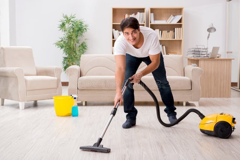 The Man Cleaning Home with Vacuum Cleaner Stock Image - Image of casual ...