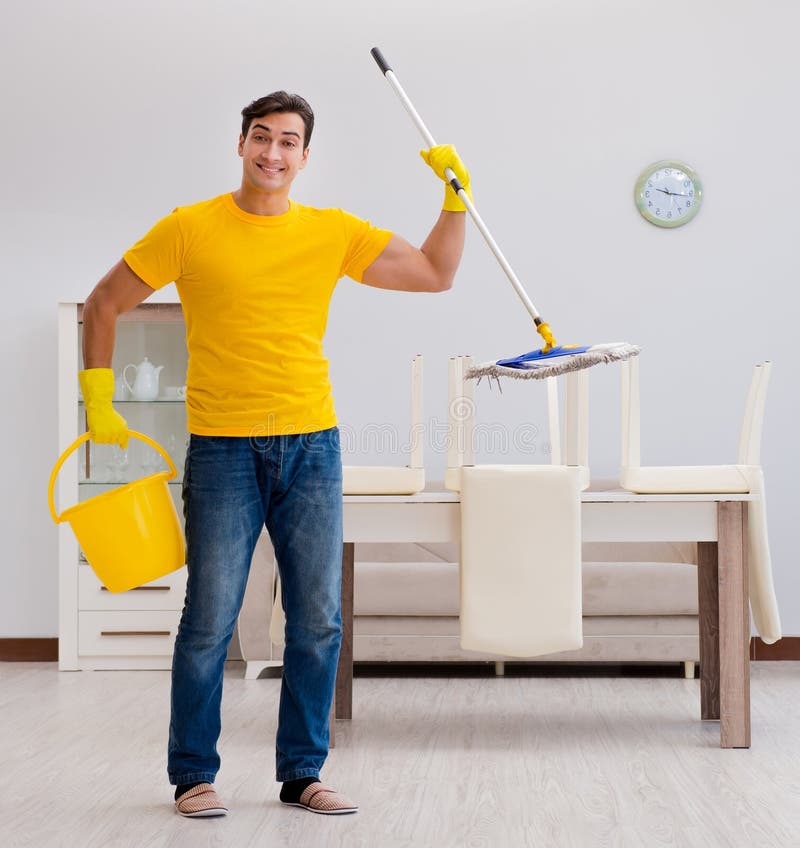 Man Cleaning the House Helping His Wife Stock Image - Image of dust ...