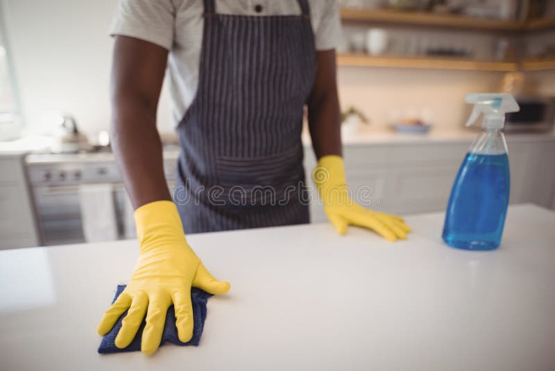 Man Cleaning the Kitchen Worktop Stock Image - Image of clothing ...