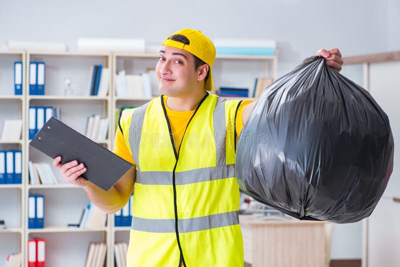 The Man Cleaning the Office and Holding Garbage Bag Stock Image - Image ...