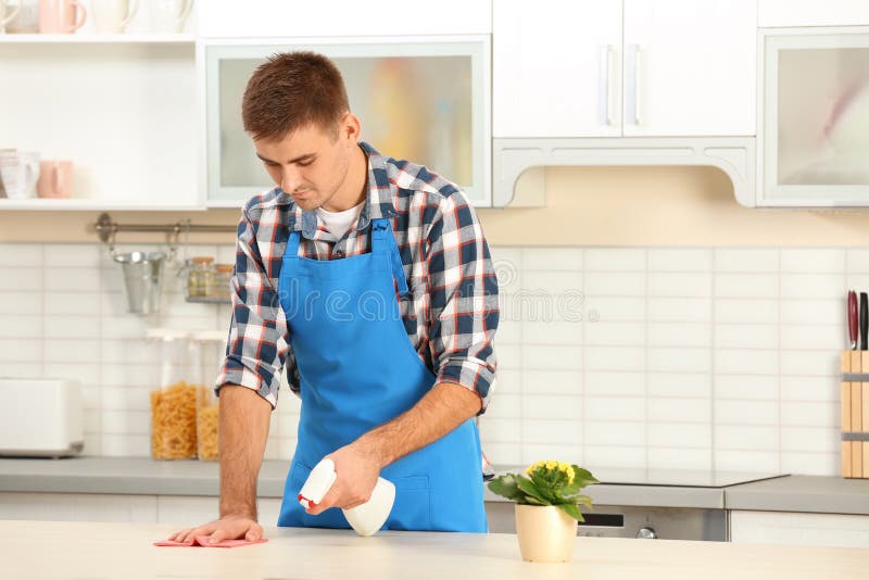 Man Cleaning Table with Rag Stock Photo - Image of countertop, business ...