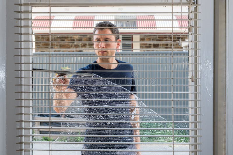 Man Cleaning the Window of a House Stock Photo - Image of housework ...